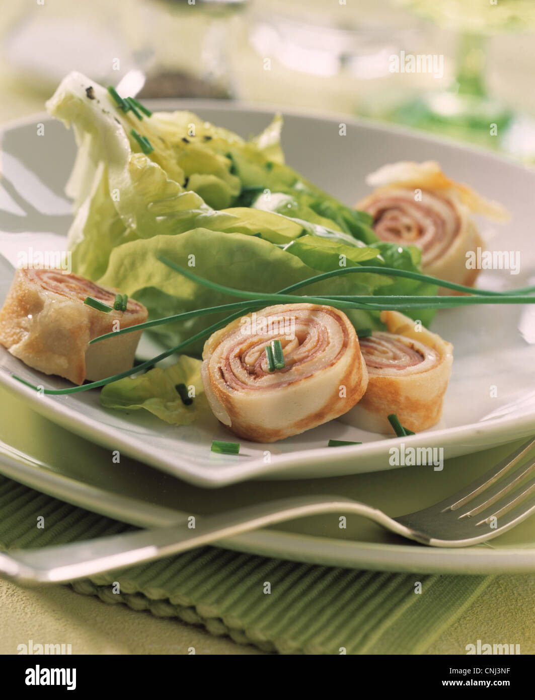 Lettuce - hearts with chive - vinaigrette and ham - crespelle Stock ...