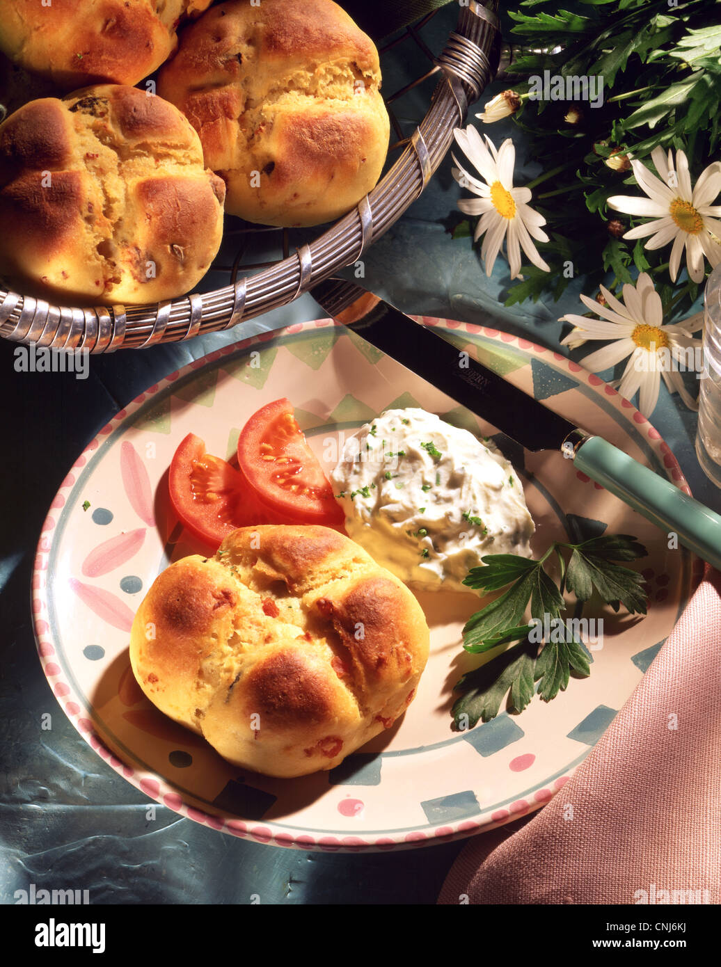 Bacon bun with herbal curd Stock Photo - Alamy