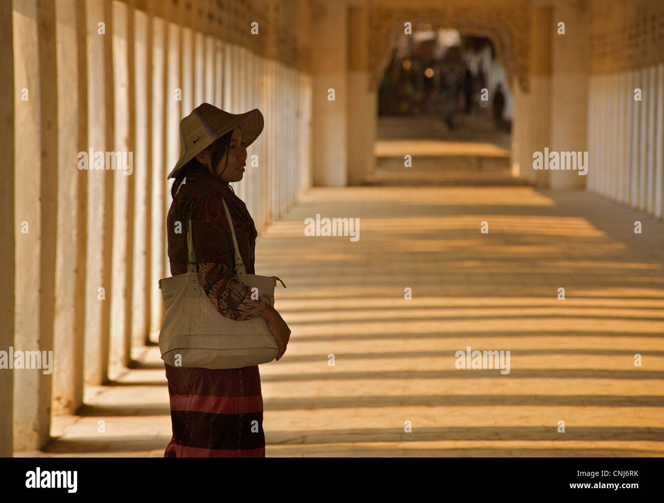 Burmese woman in the corridor at Shwezigon Pagoda, Bagan. Burma. Model ...