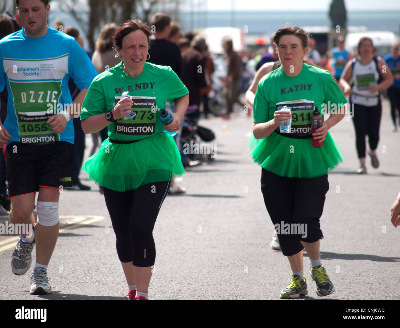 Runners in green tutus Stock Photo - Alamy
