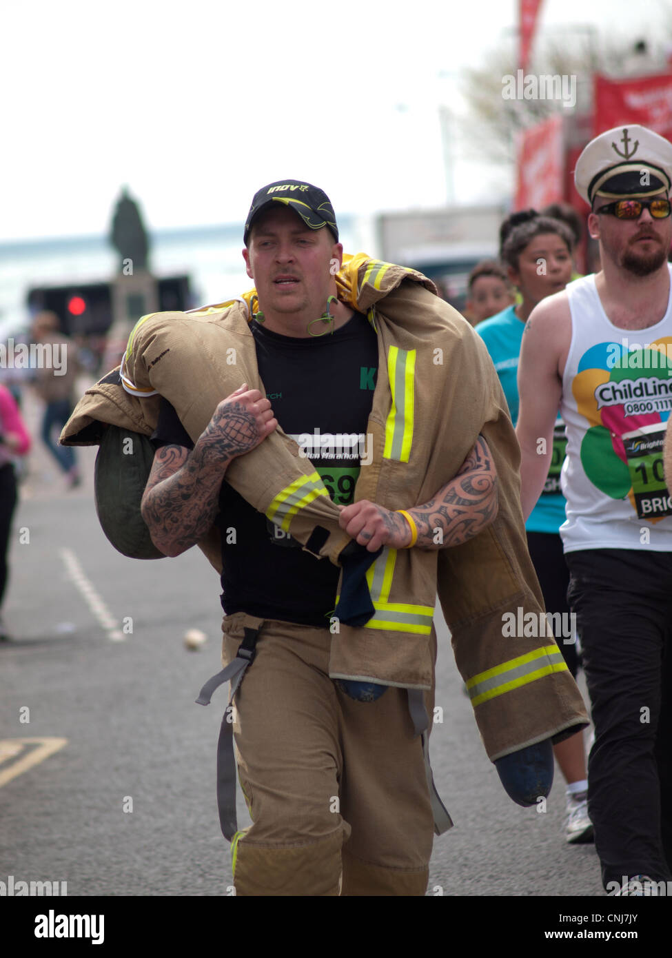 Running fireman hi-res stock photography and images - Alamy