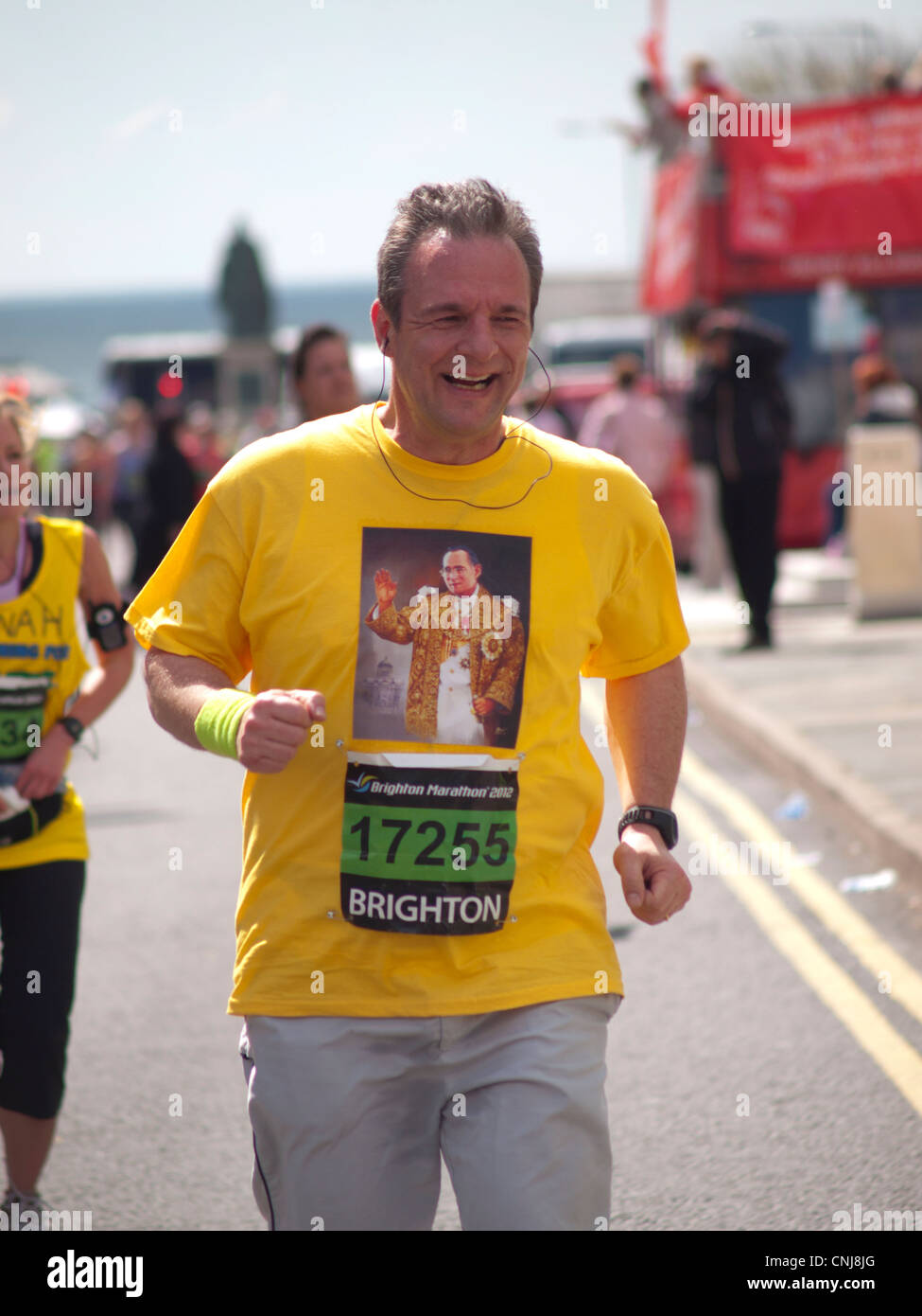 A happy runner on the Brighton Marathon Stock Photo - Alamy