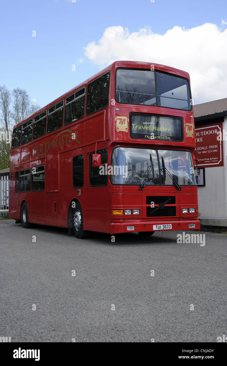 Red double decker Travelmaster bus Stock Photo - Alamy