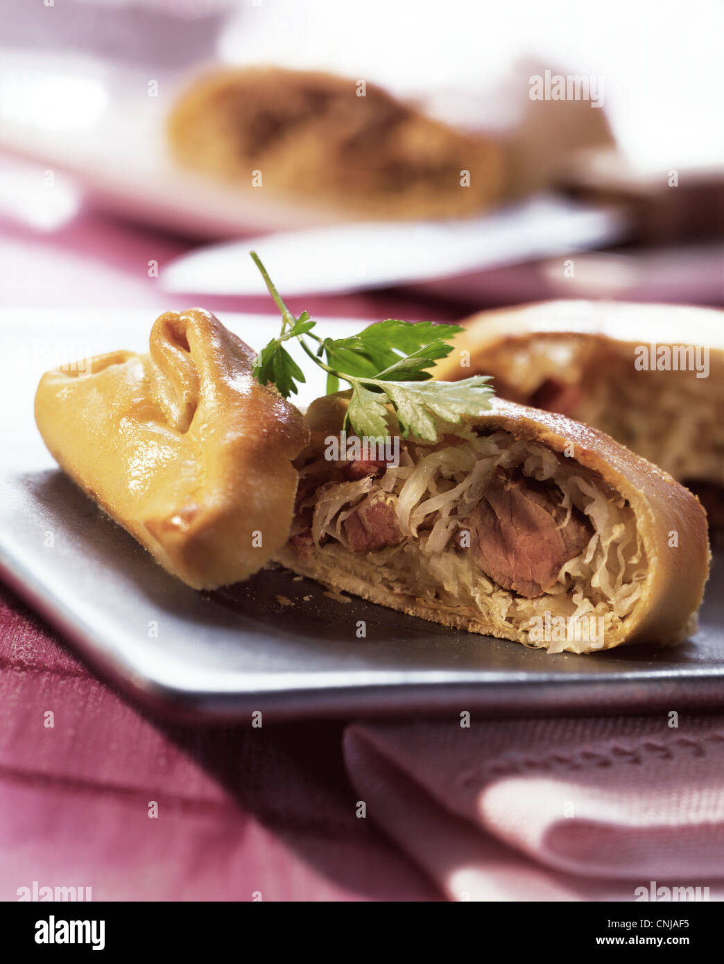 Herb strudel with pork filet Stock Photo - Alamy