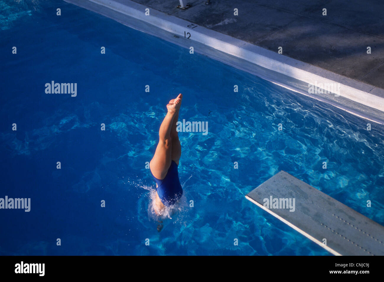 Action of female diver Stock Photo - Alamy
