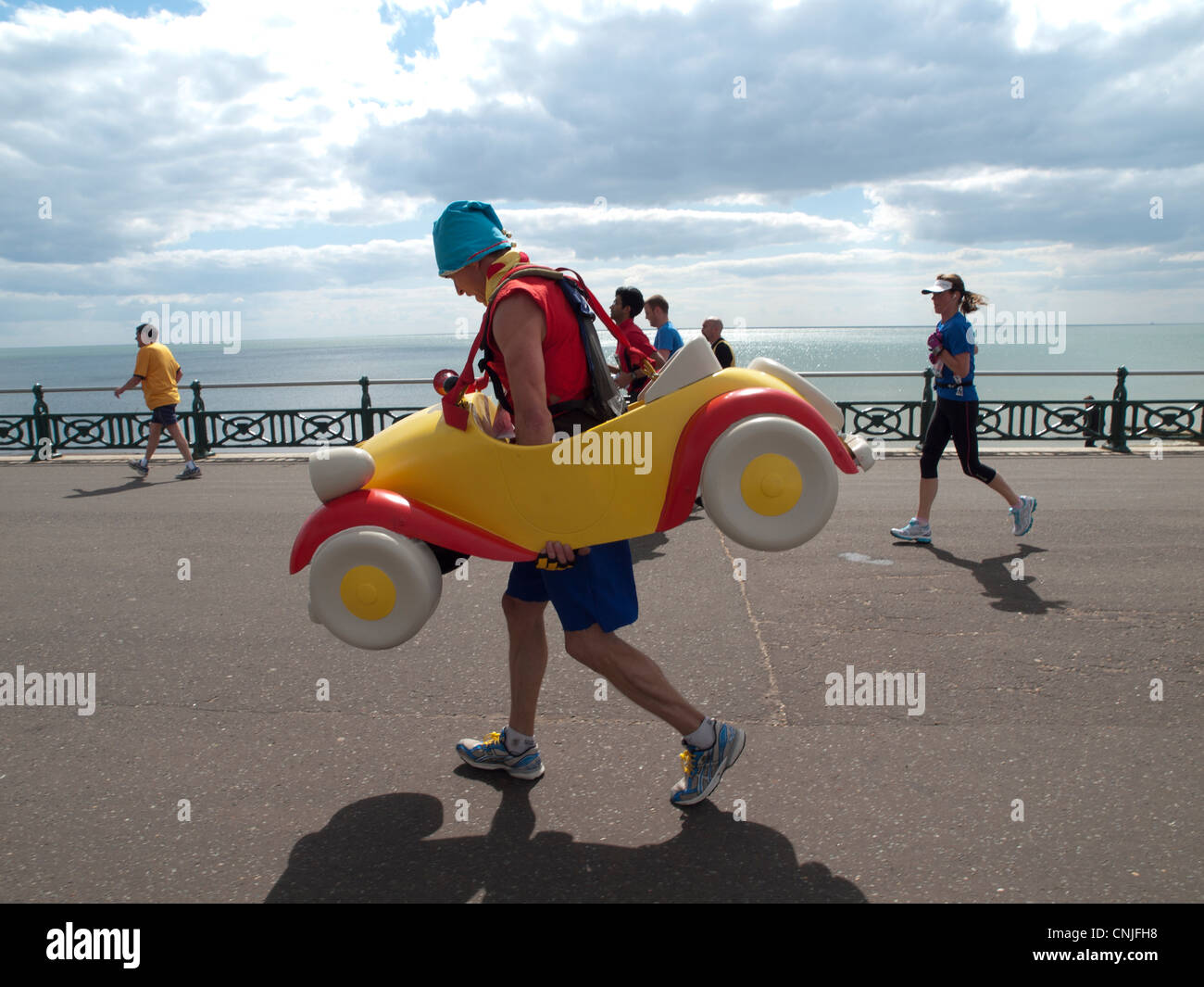 A Brighton Marathon runner dressed as Noddy Stock Photo - Alamy