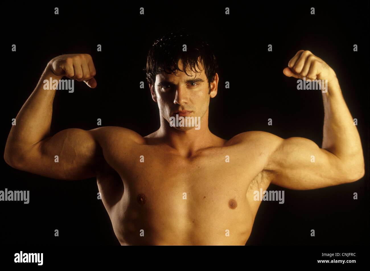 Flexed arms hi-res stock photography and images - Alamy