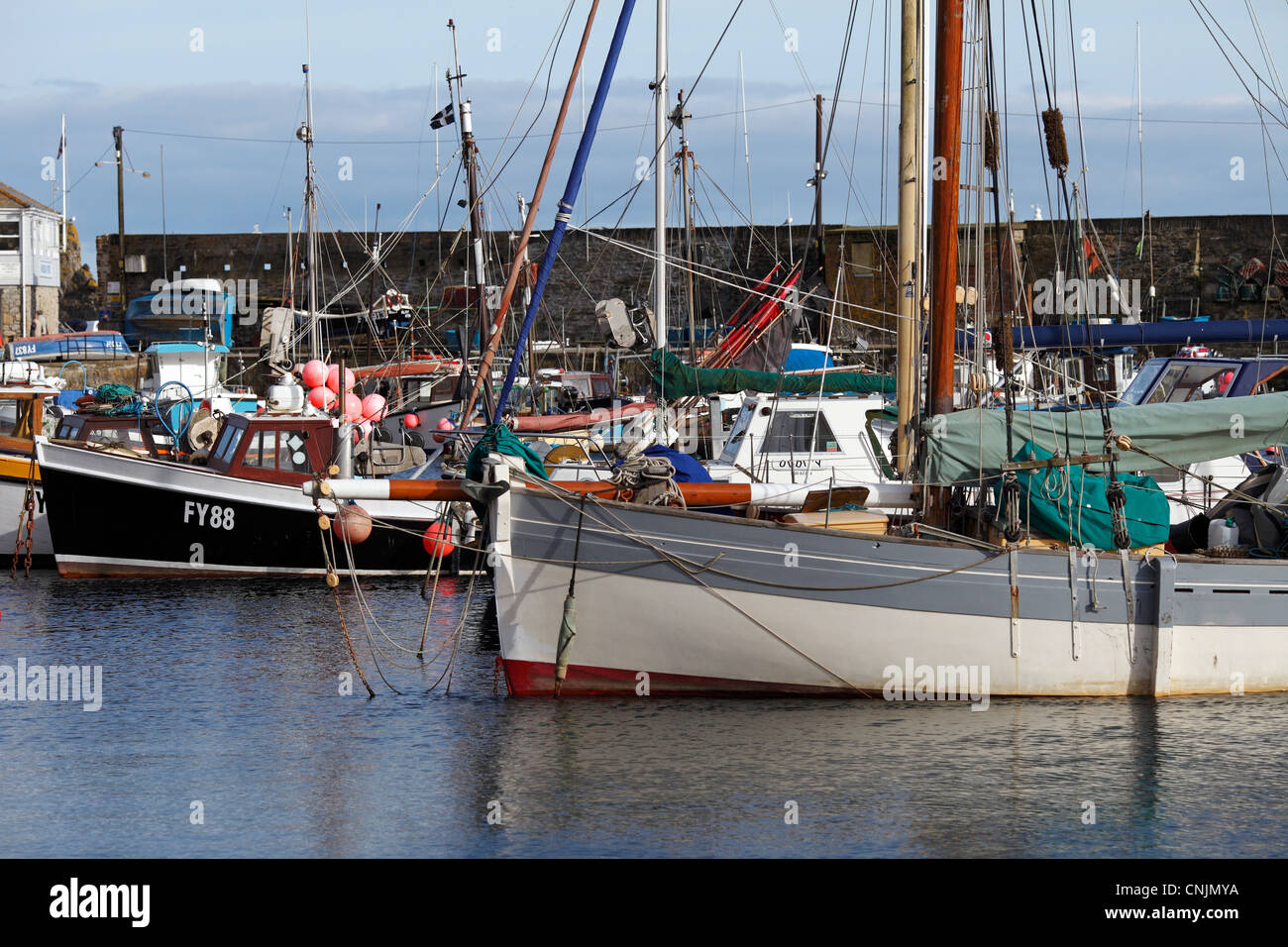 inshore fishing boats in Polperro Harbour, Cornwall Stock Photo - Alamy