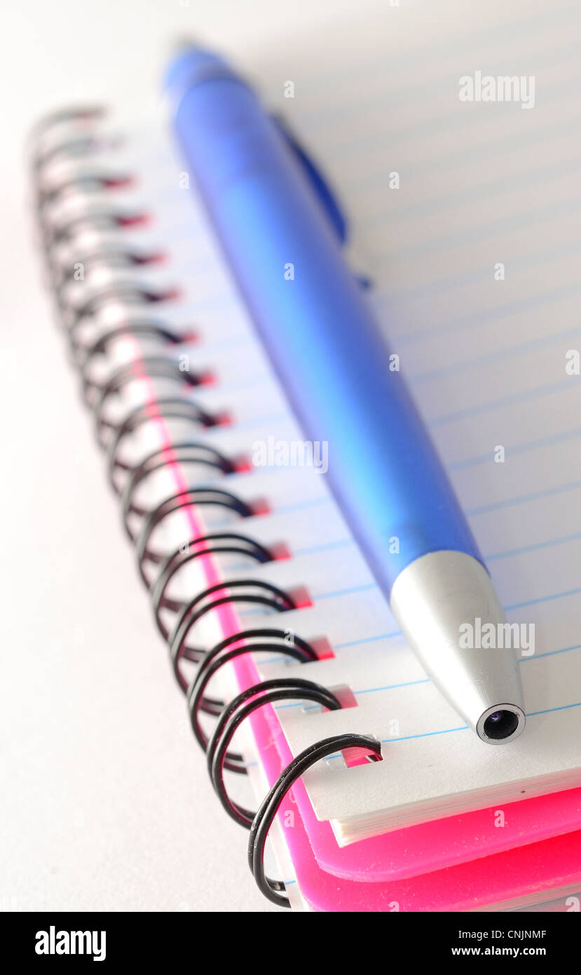 Macro shoot of pen and note pad at the office Stock Photo - Alamy