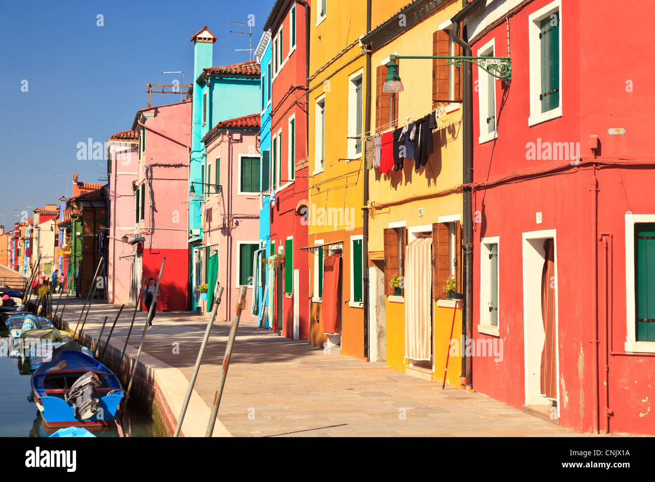 brilliantly colored buildings on Burano Island, Lagoon Tour near Venice ...