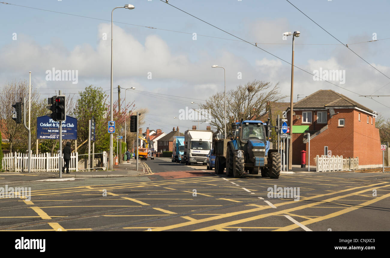 tractor and trailer traveling / approaching train / tram level crossing ...
