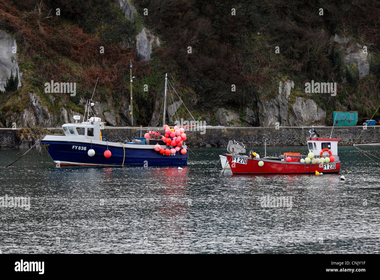 inshore fishing boats in Polperro Harbour, Cornwall Stock Photo - Alamy