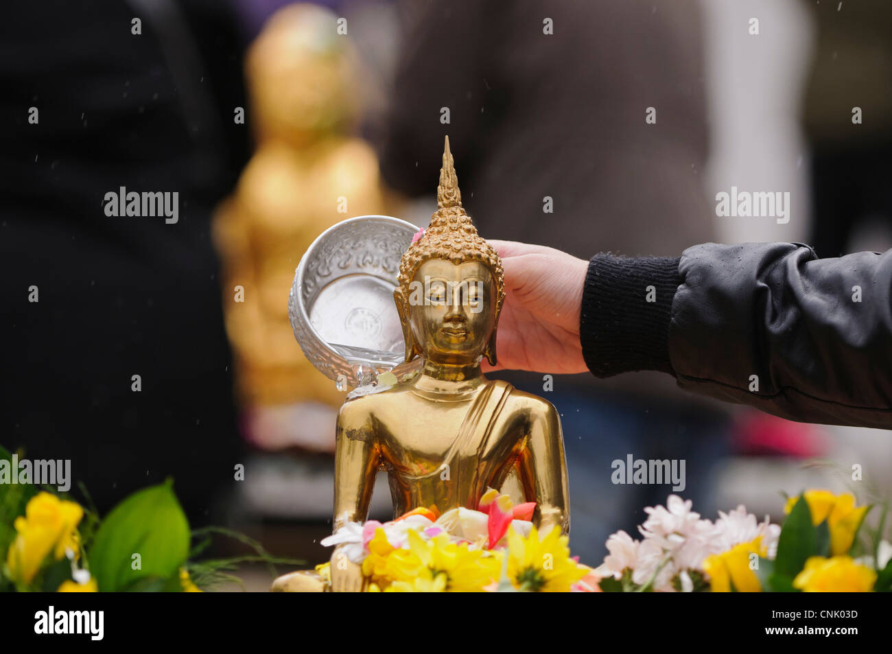 At the Thai temple of Wat Buddhapadipa to celebrate Songkran, Thai New ...