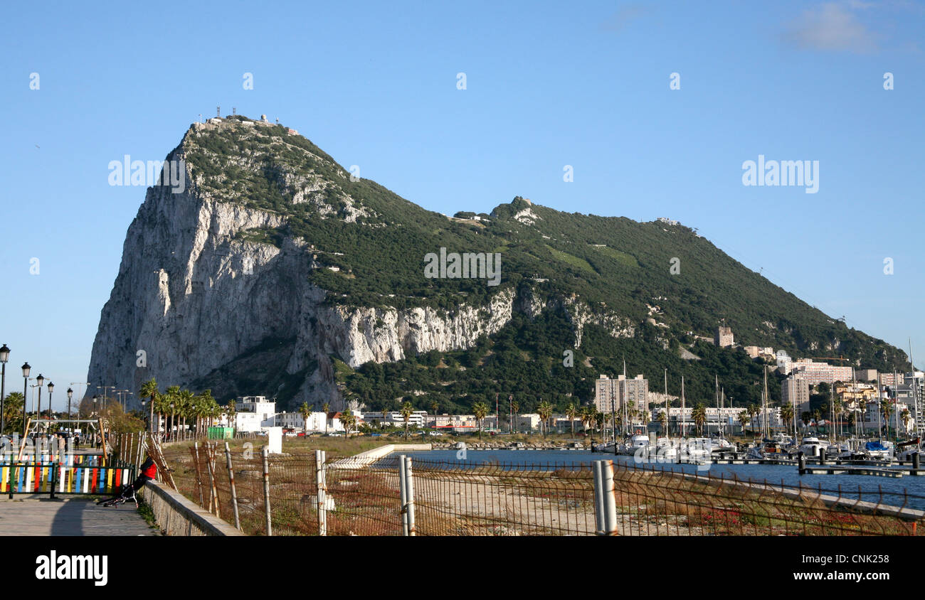 Sunny view of Rock of Gibraltar under blue sky, Gibraltar Stock Photo ...