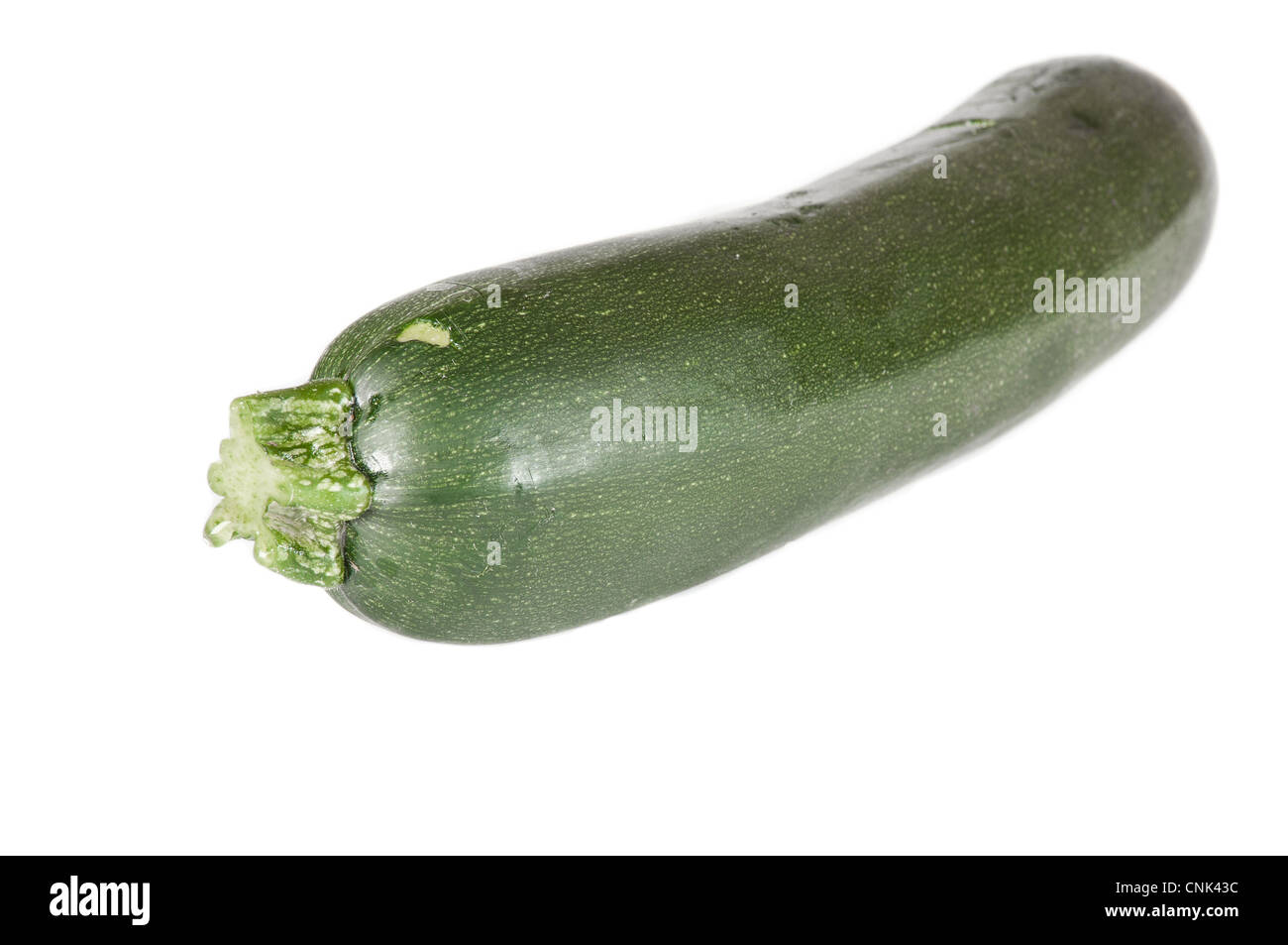 Zucchini on white background Stock Photo - Alamy