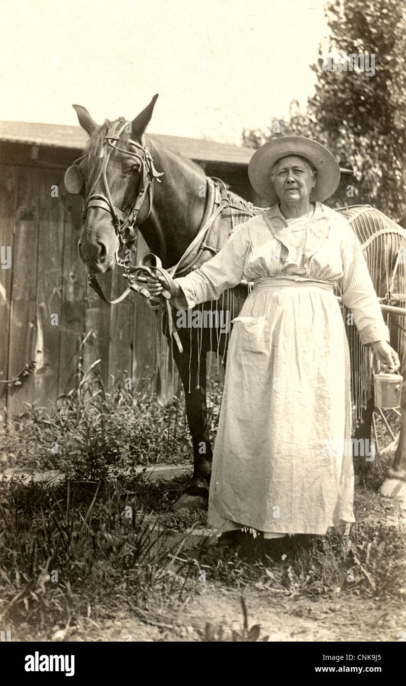 Elderly female farmer carrying hi-res stock photography and images - Alamy