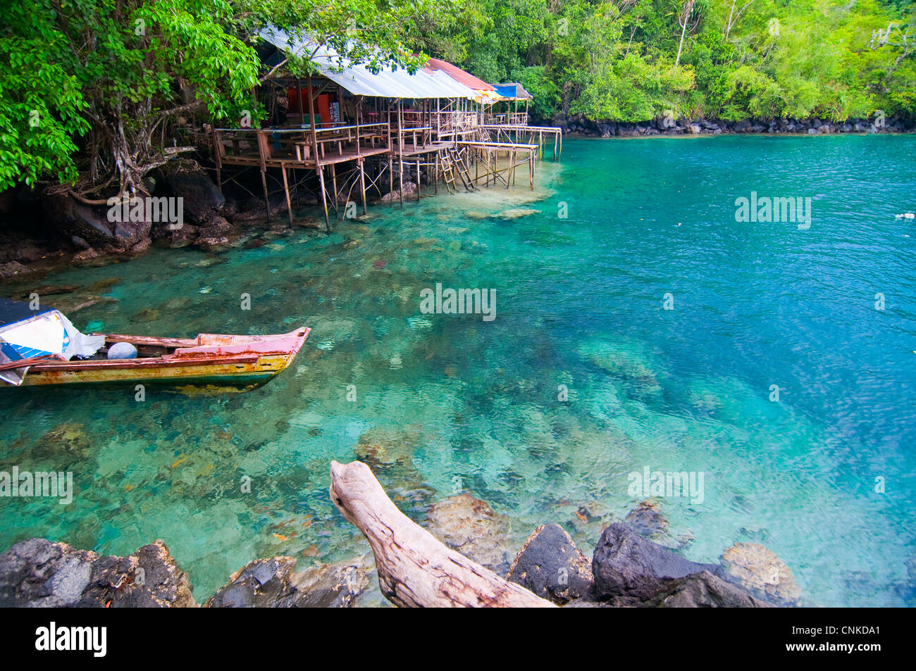 Boat and Hut at small bay Stock Photo - Alamy
