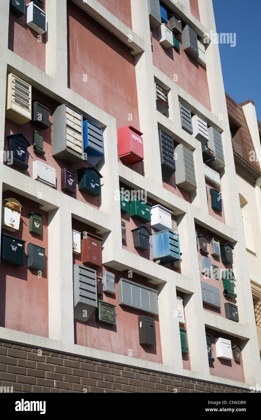 mailboxes on wall of house Stock Photo - Alamy