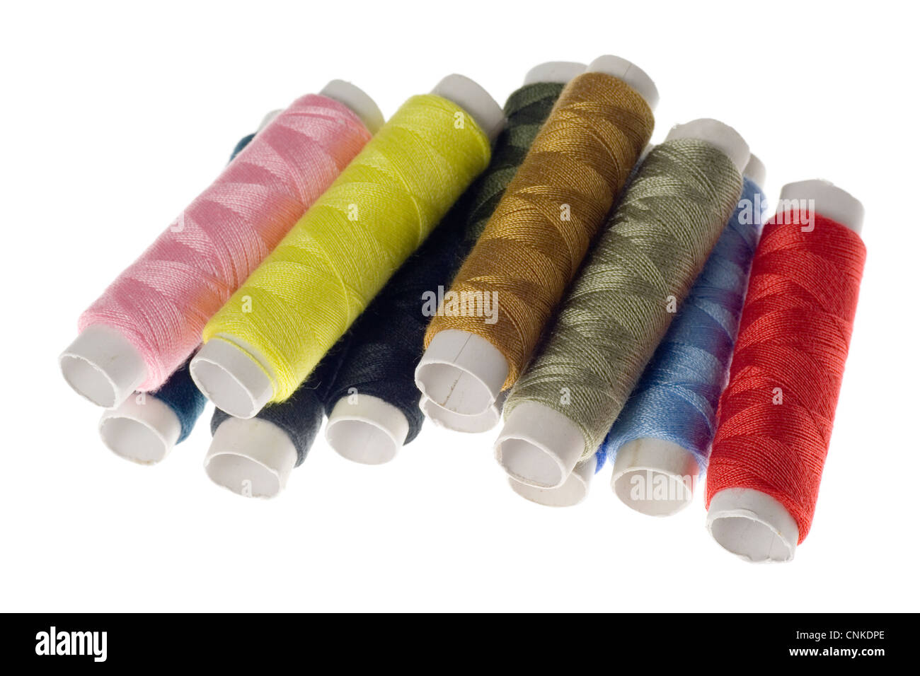 Rows of colorful sewing threads isolated on white background Stock ...