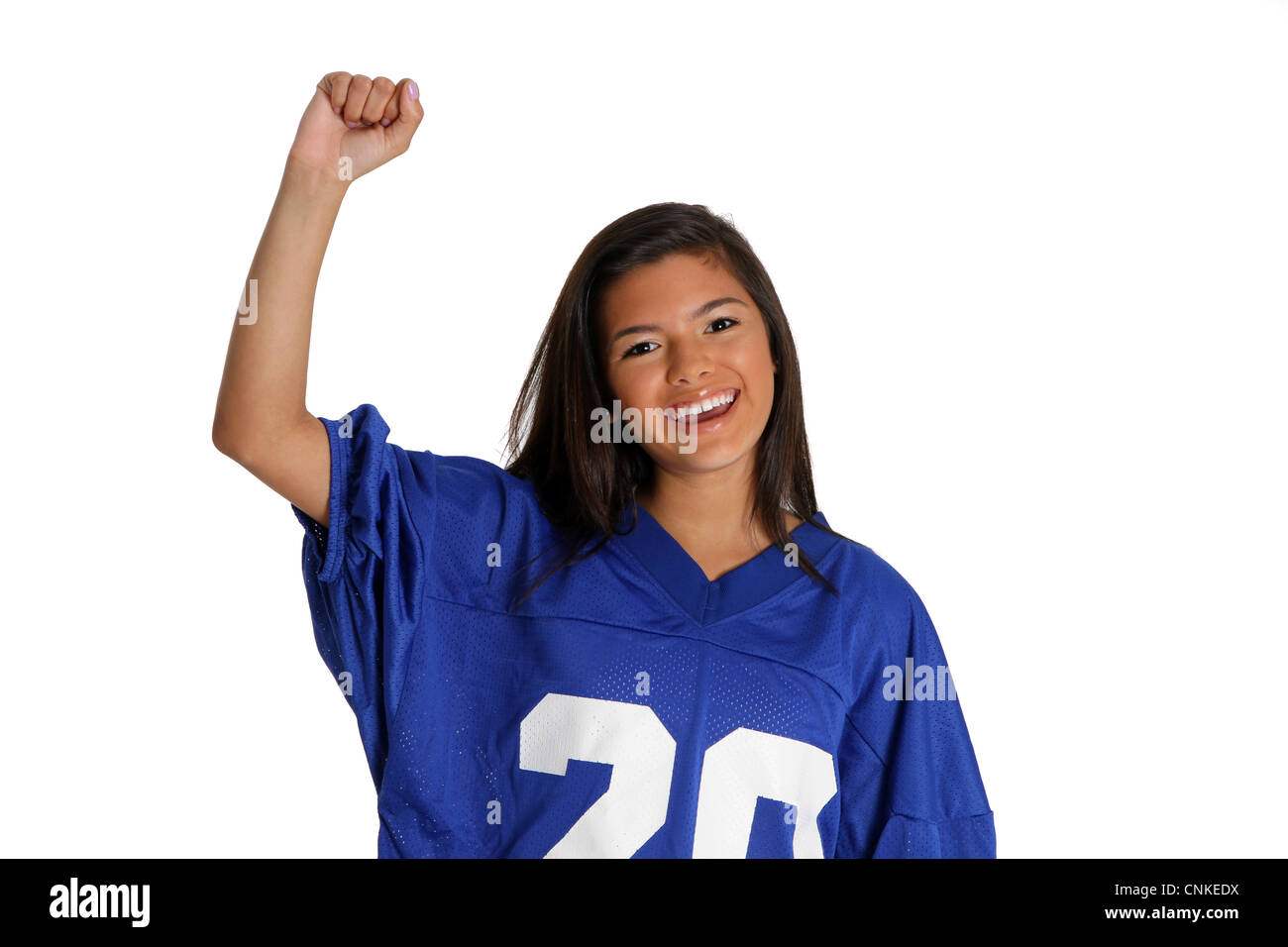 Teen cheering for her team in a jersey Stock Photo - Alamy