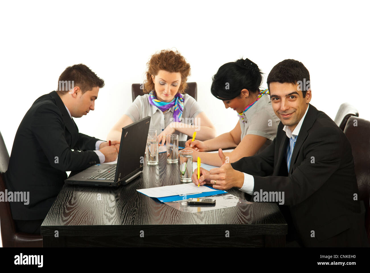 Meeting business four people at table Stock Photo - Alamy