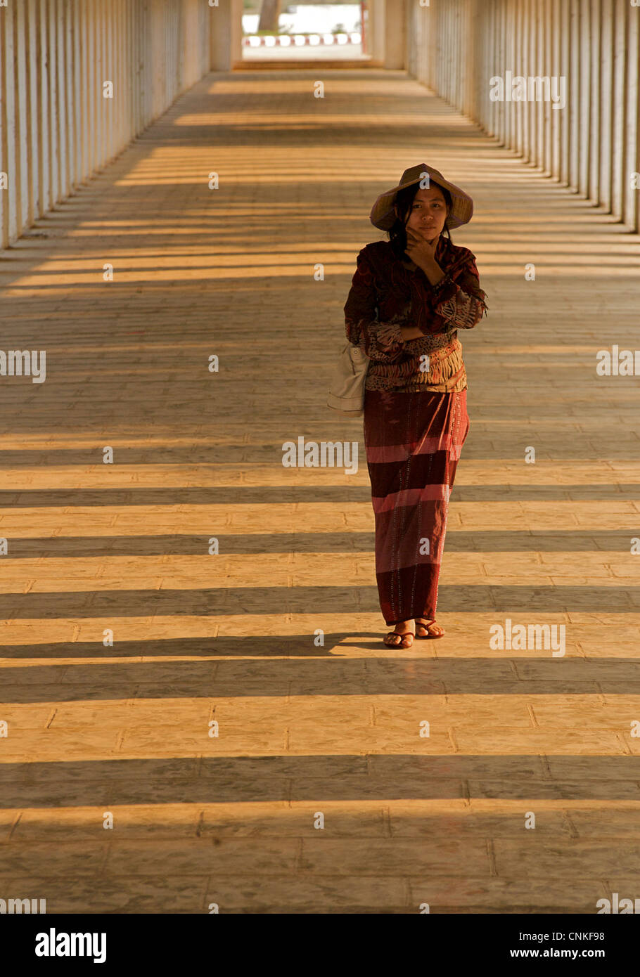 Burmese woman in the corridor at Shwezigon Pagoda, Bagan. Burma. Model ...