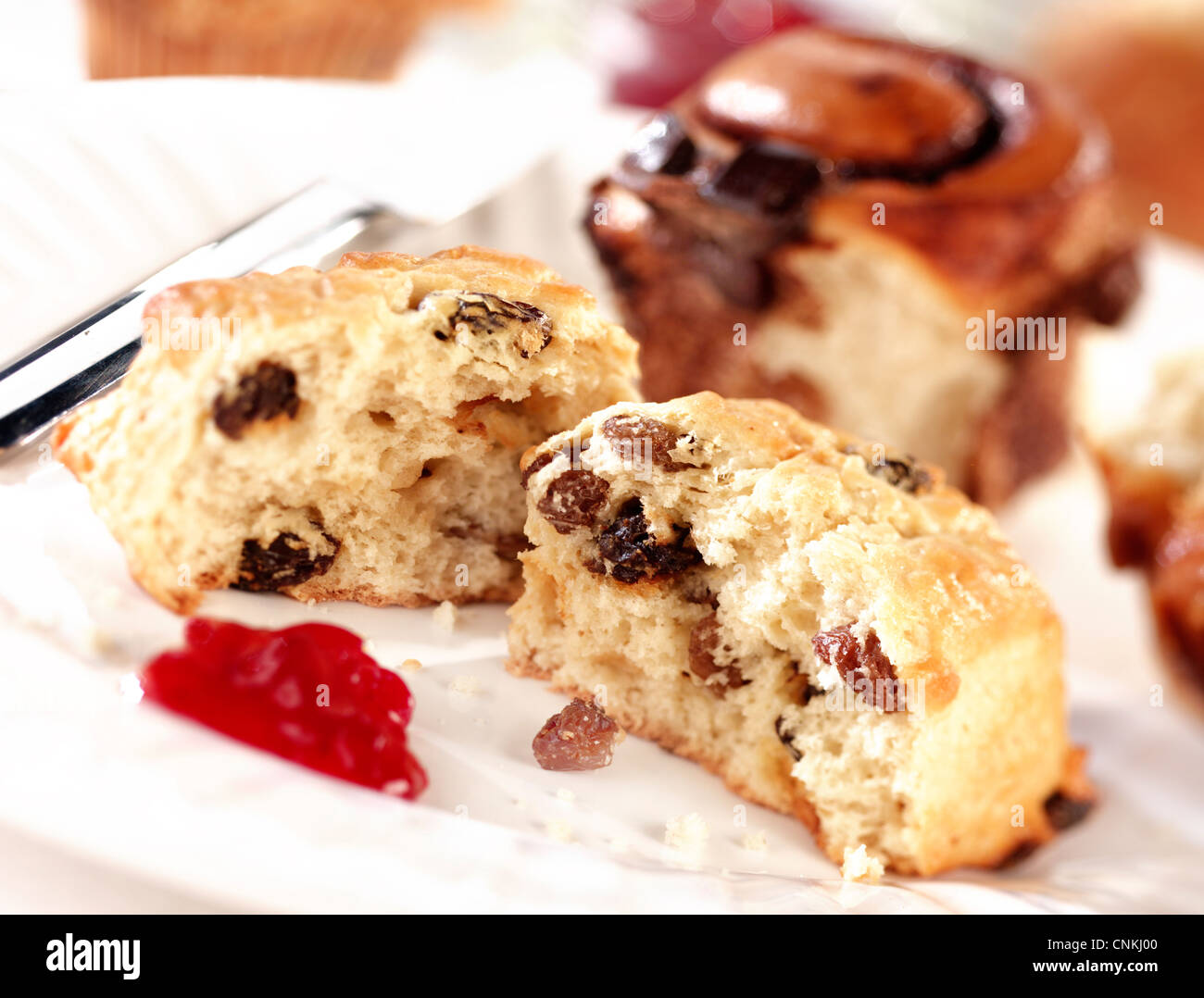 English scones with red marmelade Stock Photo - Alamy