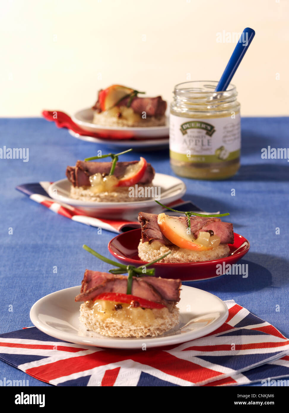 Toast snacks with roastbeef and apple sauce Stock Photo - Alamy