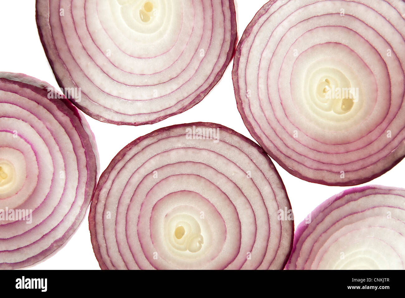 red onion slices on white background Stock Photo - Alamy