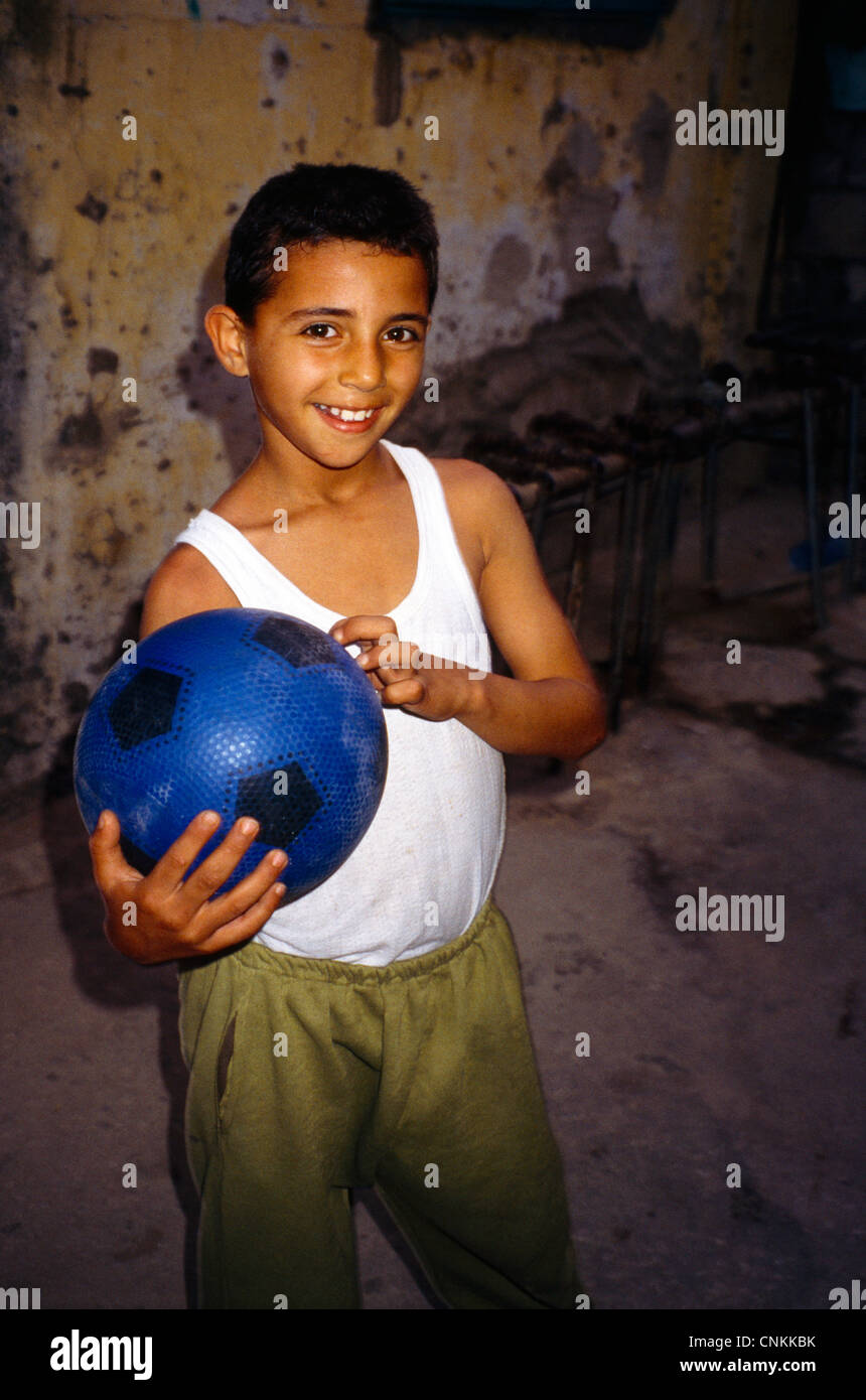 Beirut lebanon boy holding football hi-res stock photography and images ...