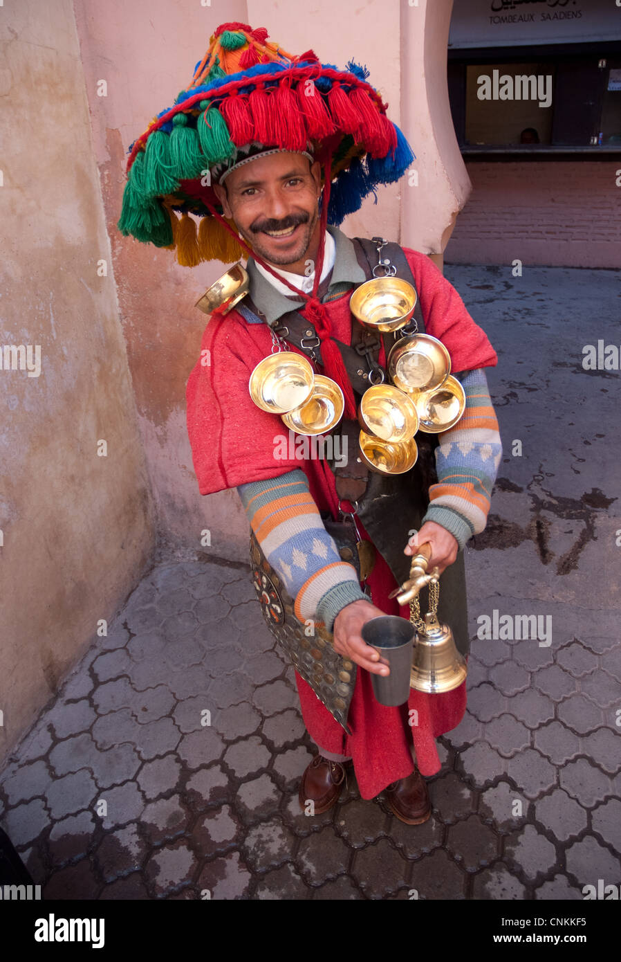 The traditional uniform and the spectacular colorful hat, of a Moroccan ...