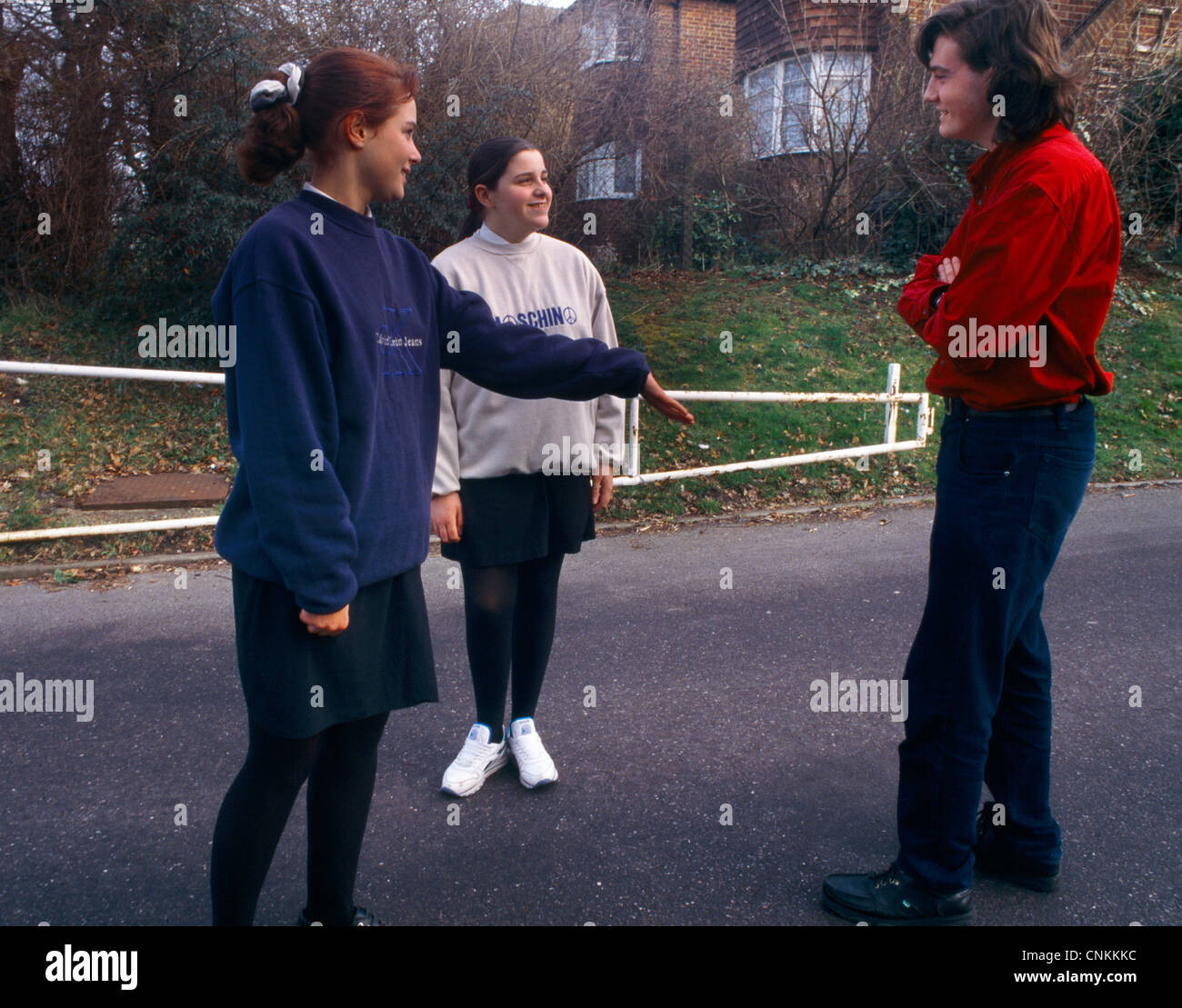 Girl Introducing Teenage Boy To Another Girl Stock Photo - Alamy