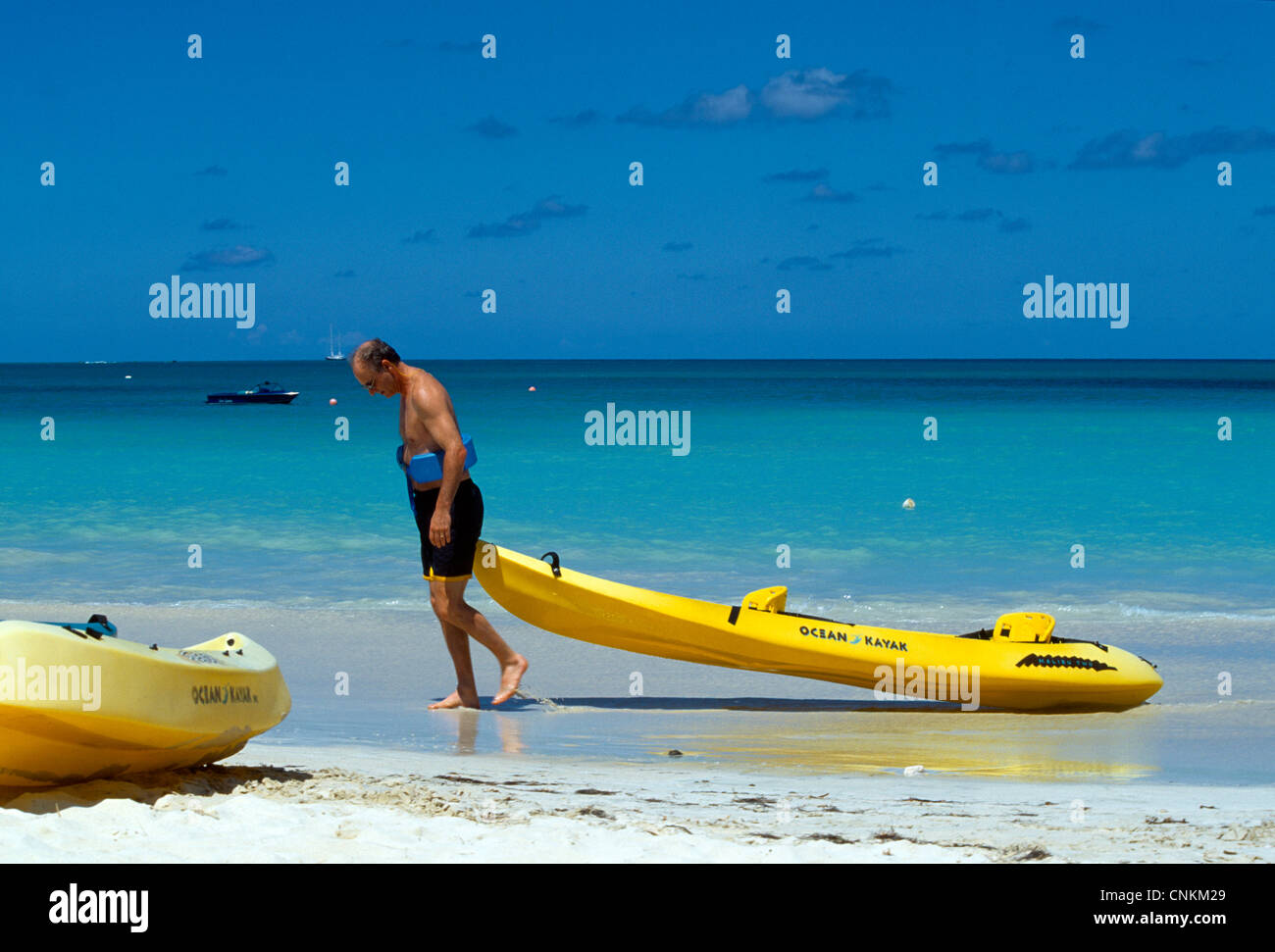 Man pulling kayak hi-res stock photography and images - Alamy