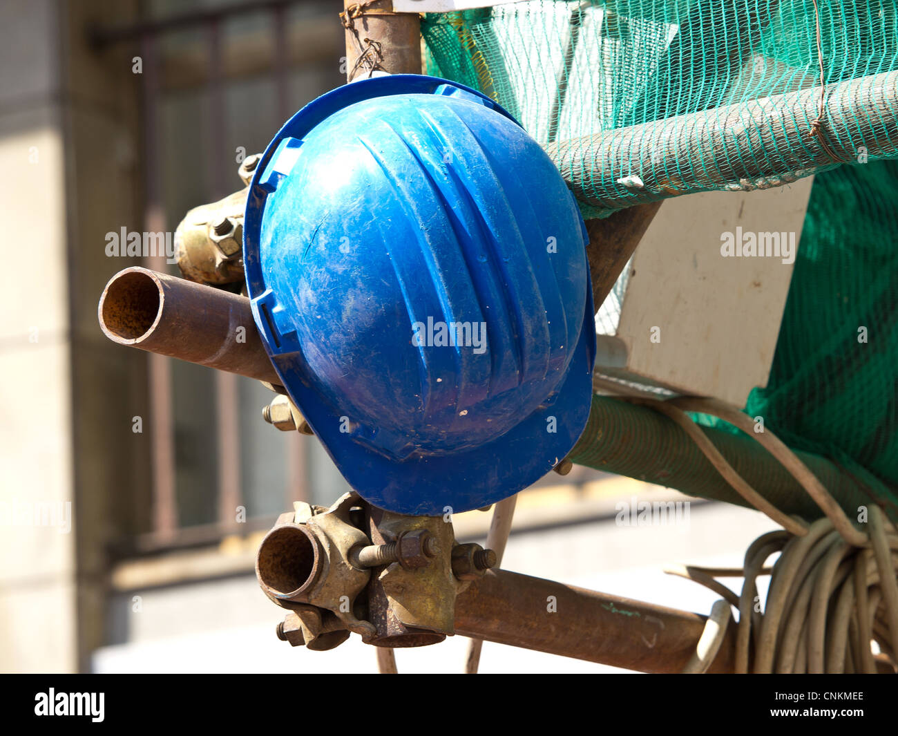 blue worker helmet on the scaffolding during the lunch breake Stock ...