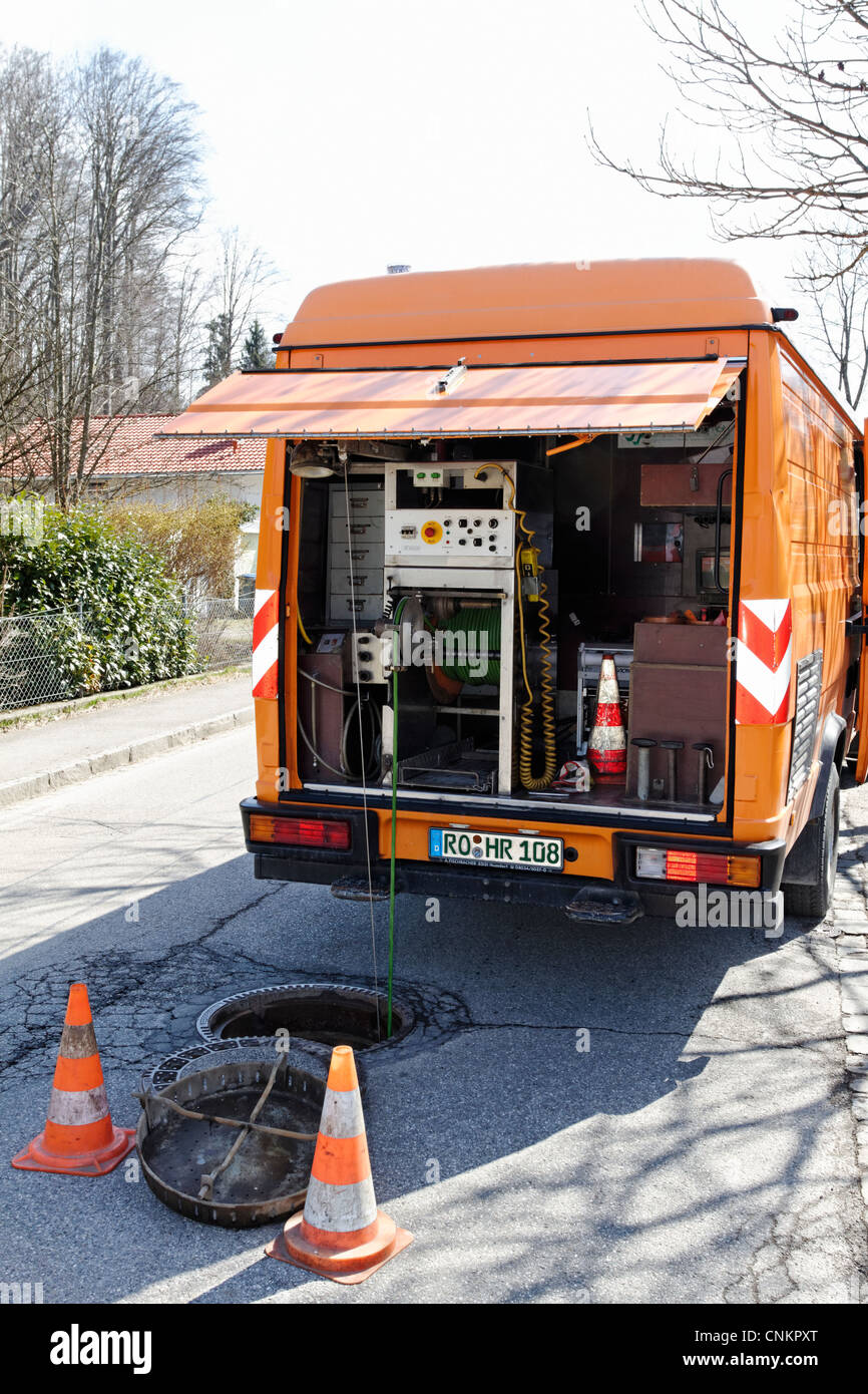 Vehicle with measuring instruments in a roadside manhole , Prien Upper ...