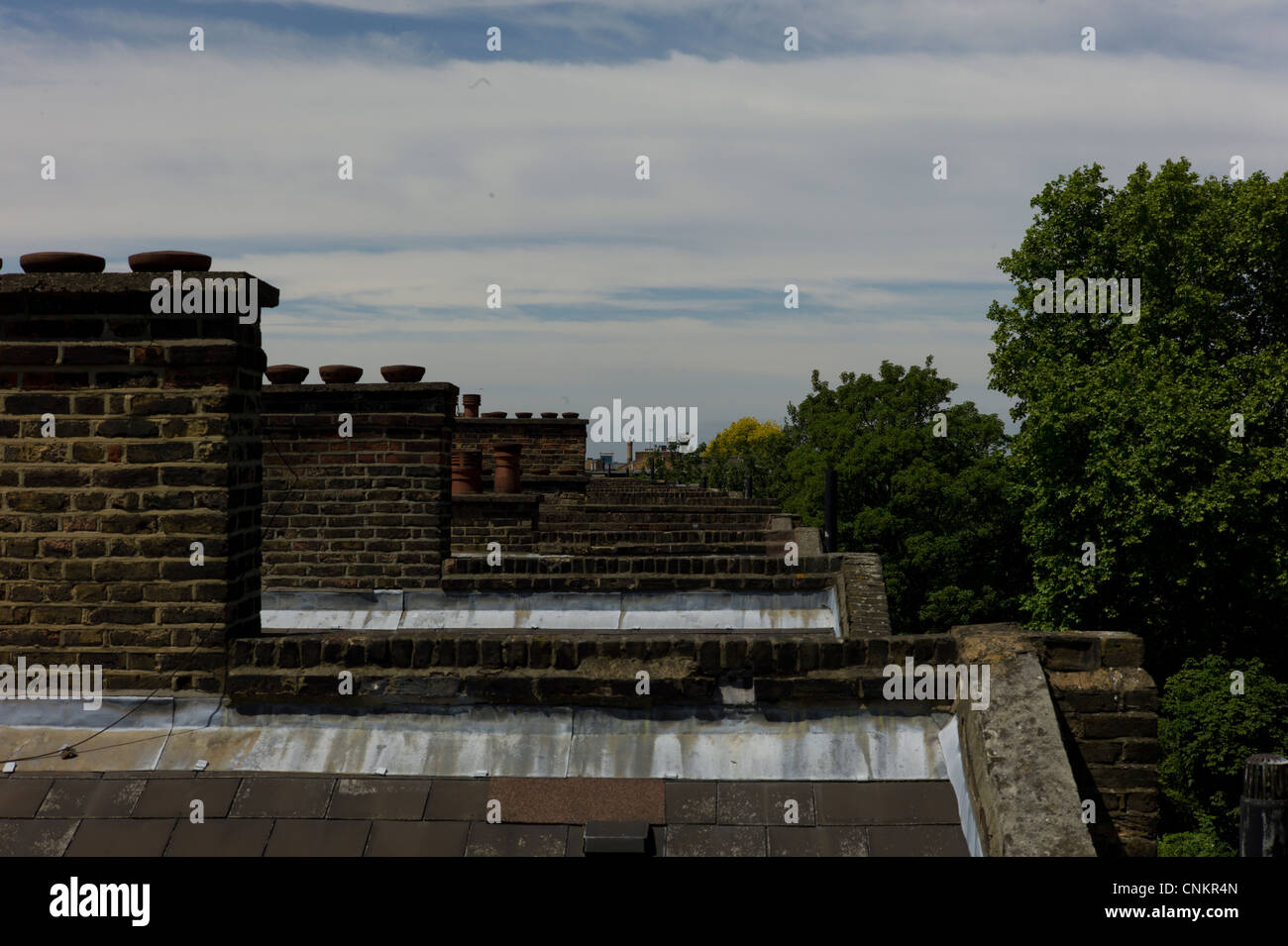Rooftops tiles chimney hi-res stock photography and images - Alamy