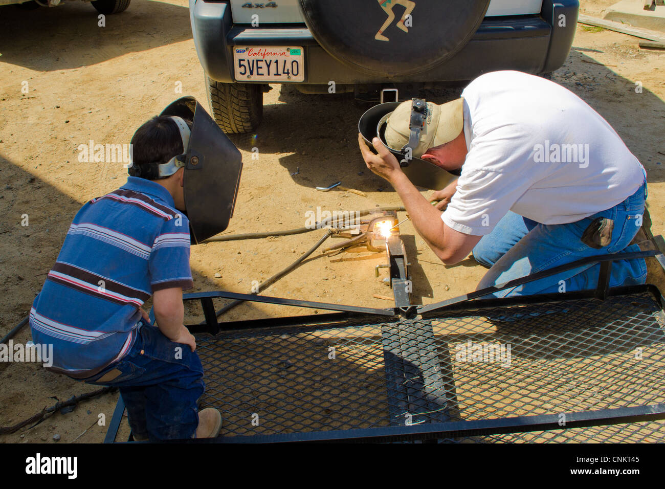 Dad helping year old hi-res stock photography and images - Alamy