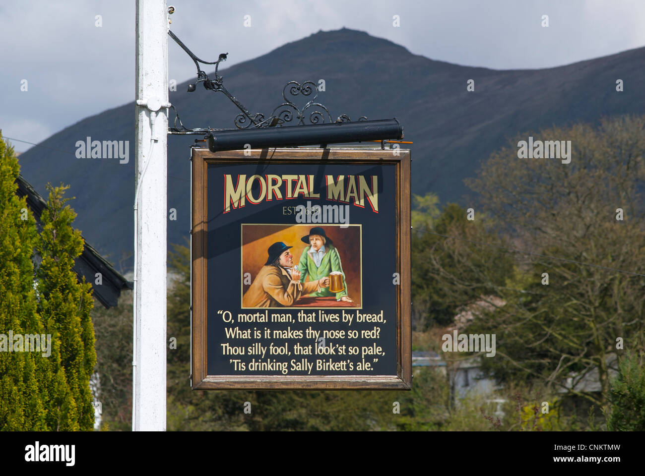 Sign for the Mortal Man pub in the village of Troutbeck, Lake District ...