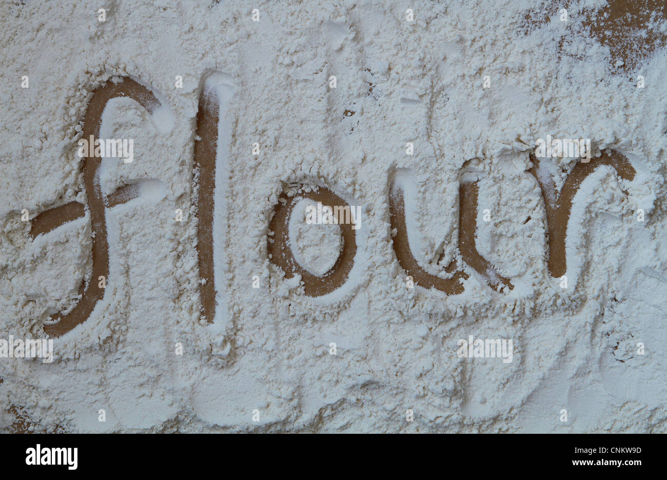Flour written in flour Stock Photo - Alamy