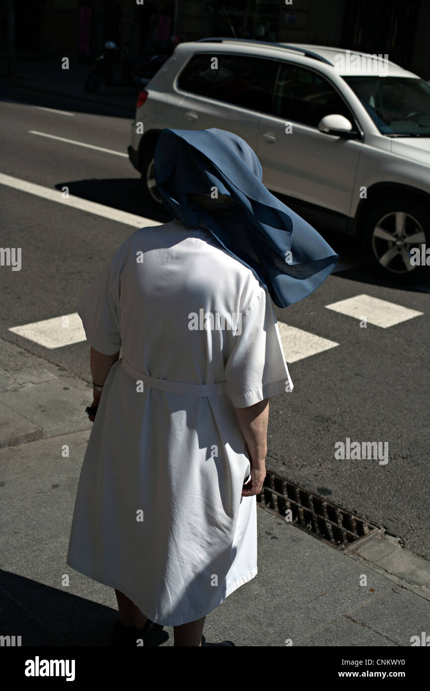 nun and car in barcelona Stock Photo - Alamy