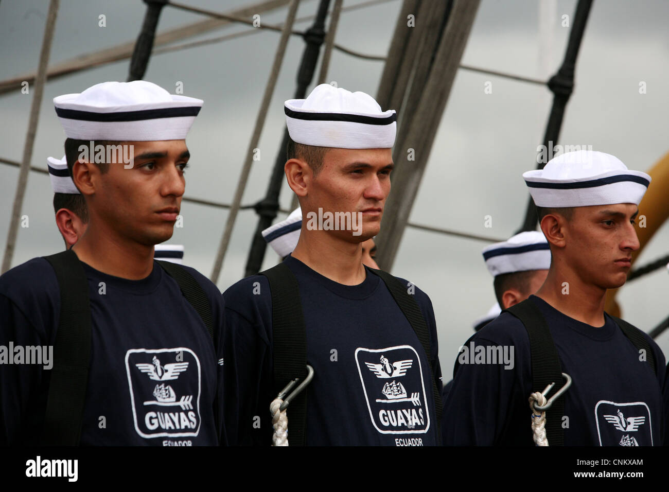 Ecuadorian sailors aboard the tall ship BAE Guayas stand at attention ...
