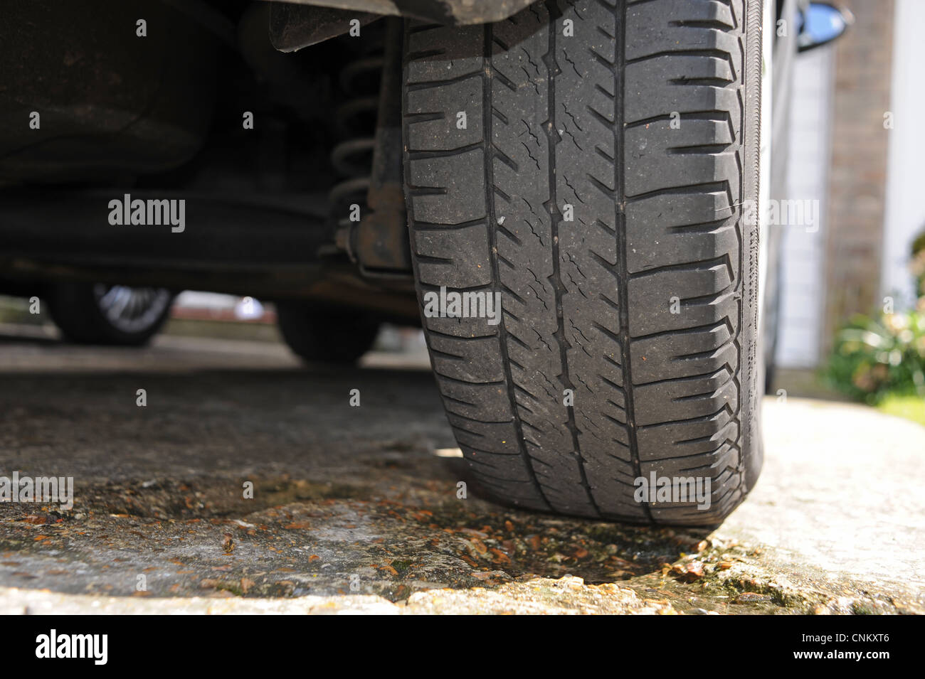 A parked car close up of a tyre Stock Photo - Alamy