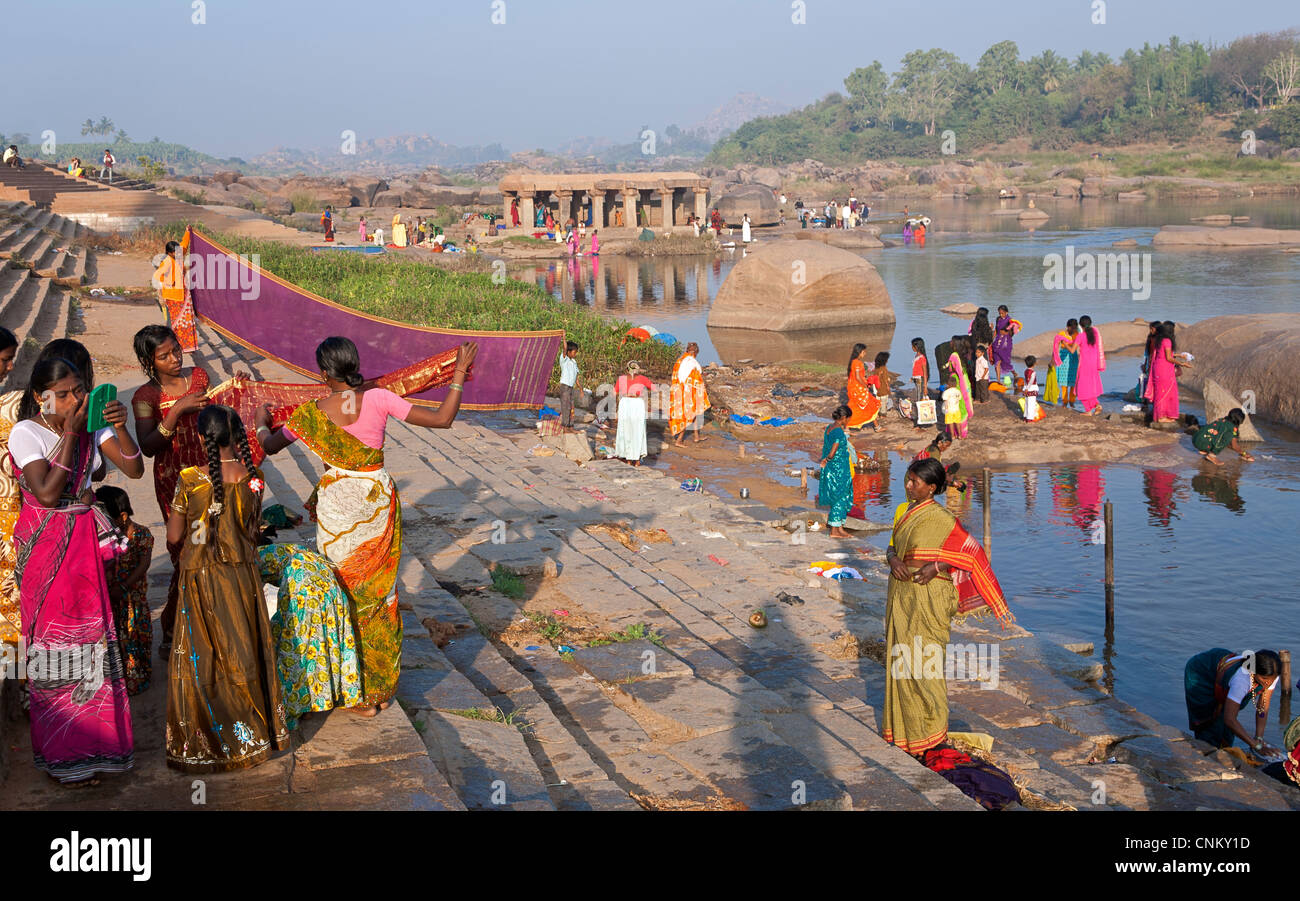 Indian woman drying clothes hi-res stock photography and images - Alamy