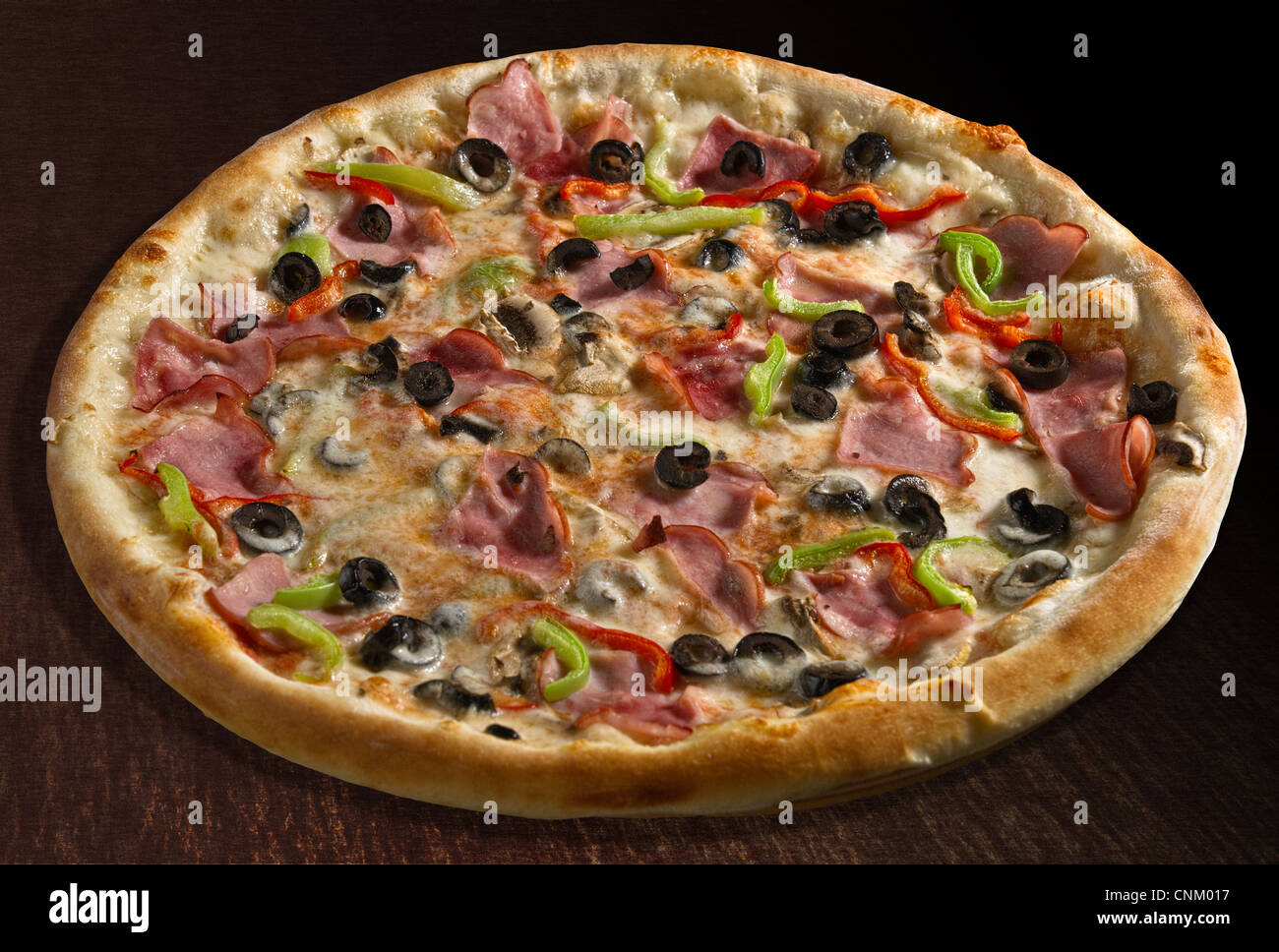 Pizza capricciosa - isolated Stock Photo - Alamy