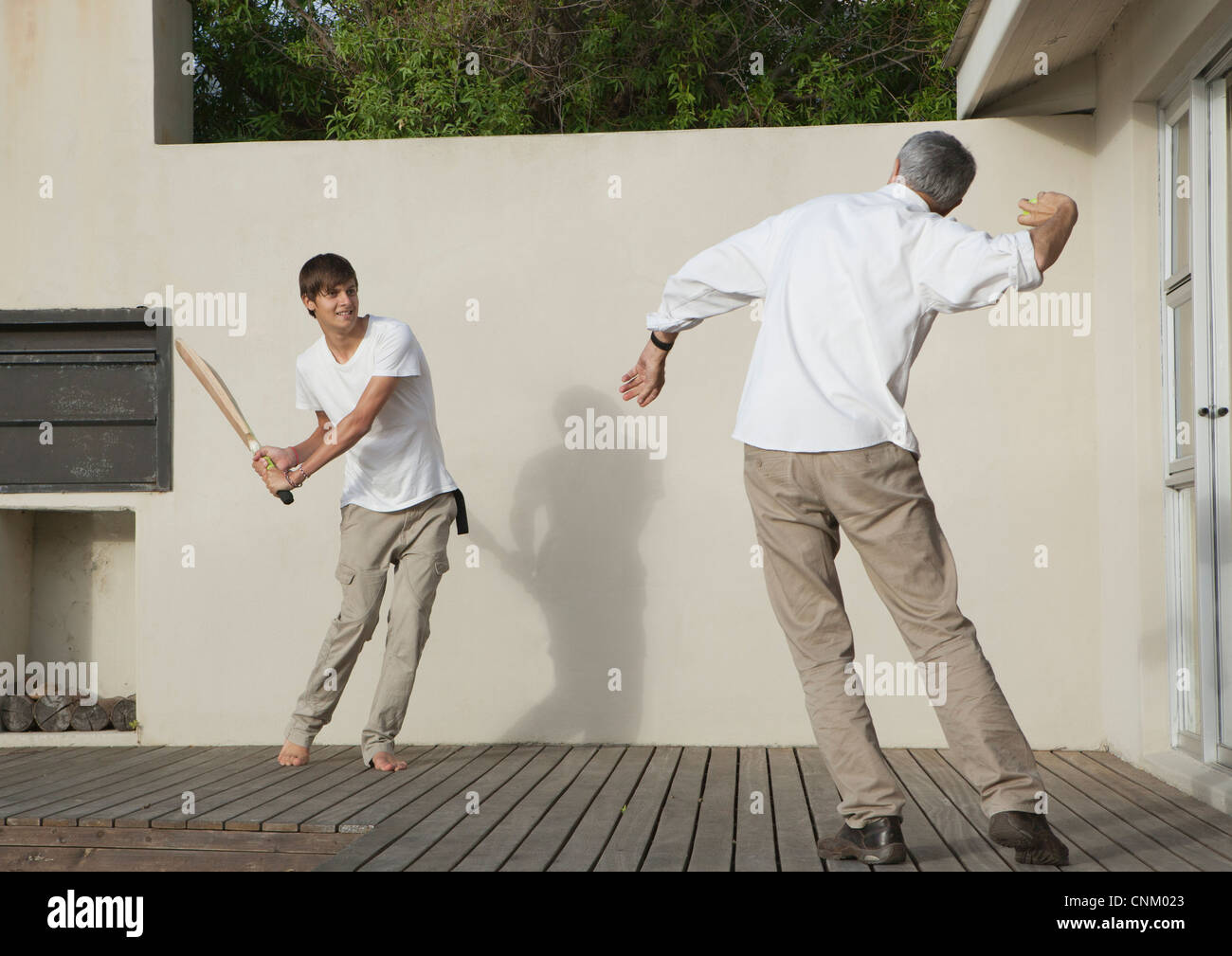 Father swinging son arms hi-res stock photography and images - Alamy