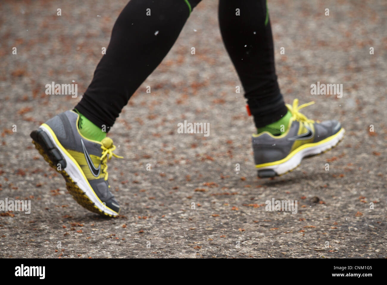 Runner legs and running shoes closeup Stock Photo - Alamy