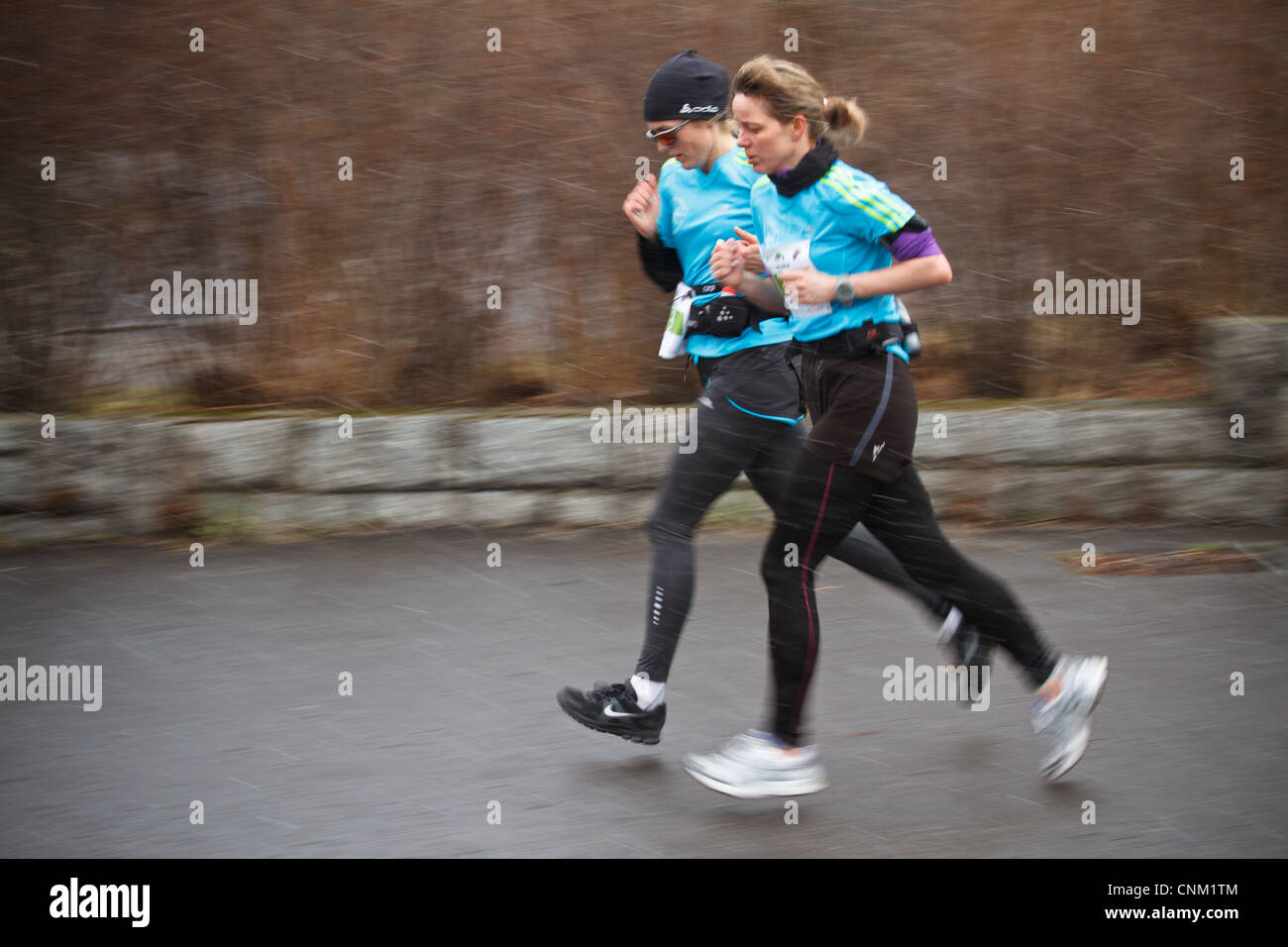 Two running girls Stock Photo - Alamy