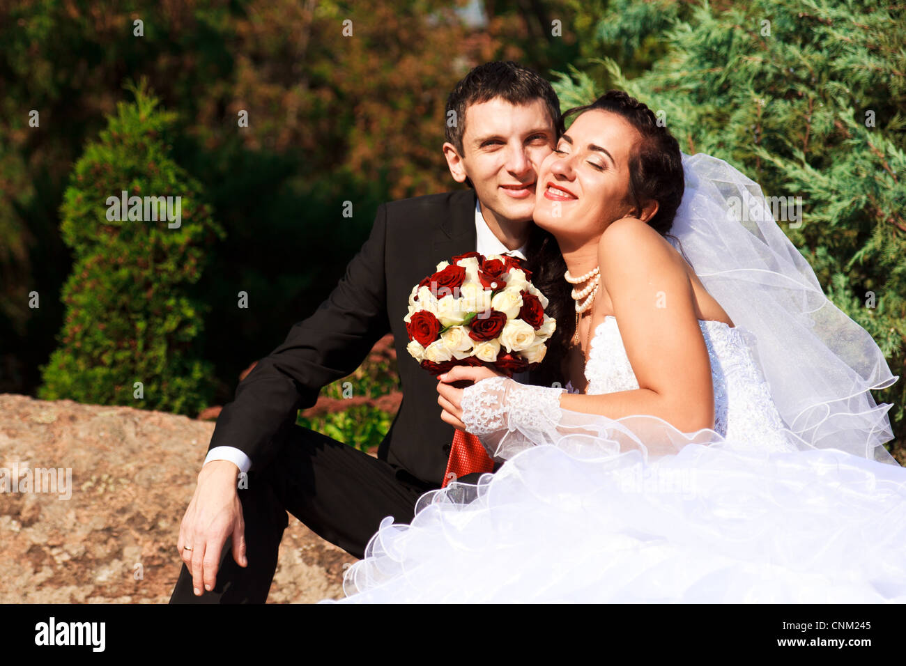 Happy bride and groom outdoor Stock Photo - Alamy