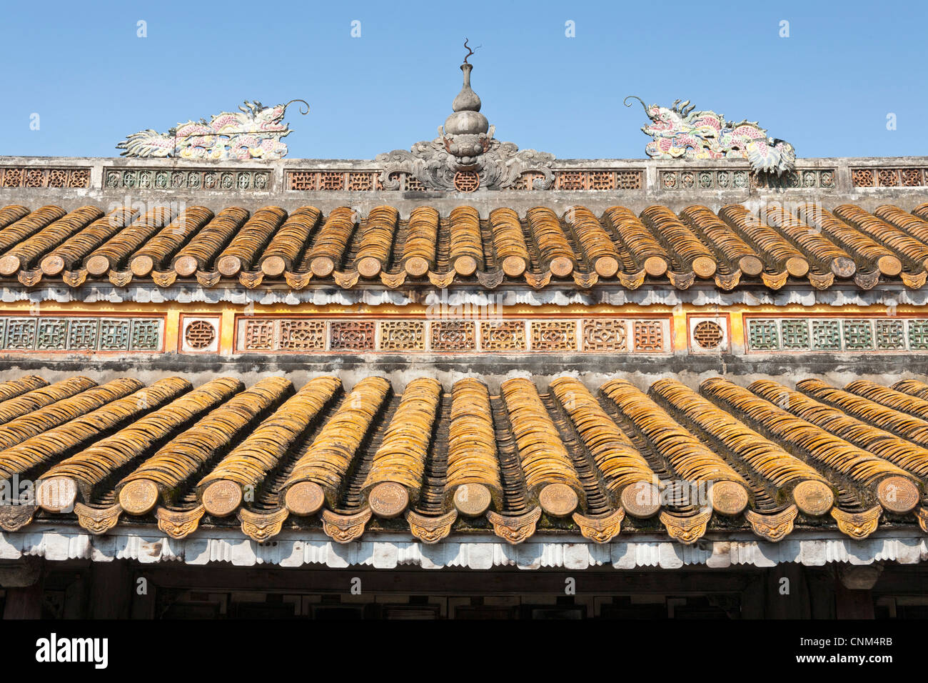 Tiled roof of Hoa Khiem Palace, at the tomb of Emperor Tu Duc, near Hue ...
