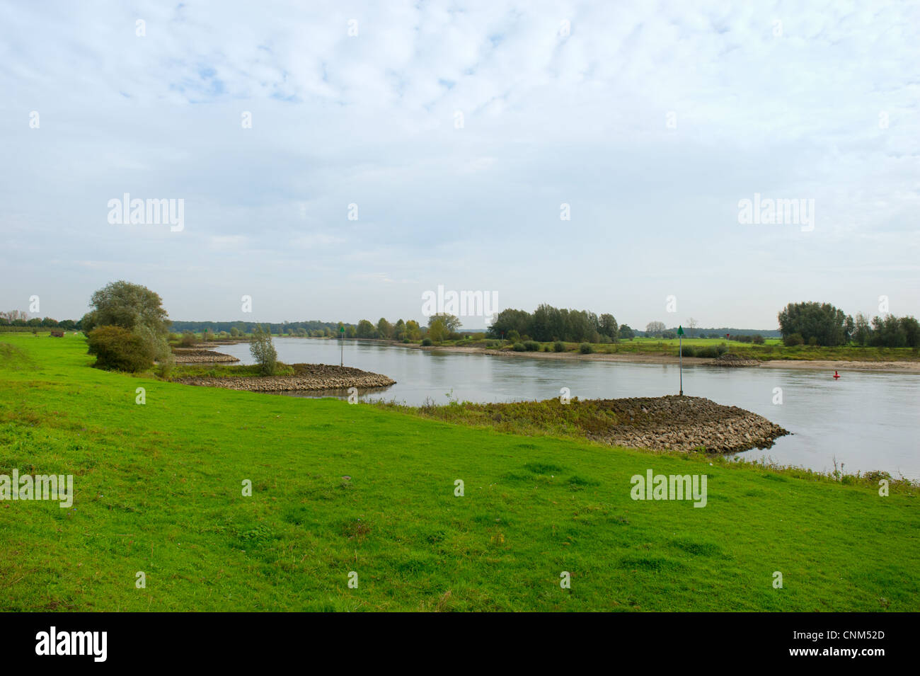 Dutch river the IJssel with breakwaters Stock Photo - Alamy